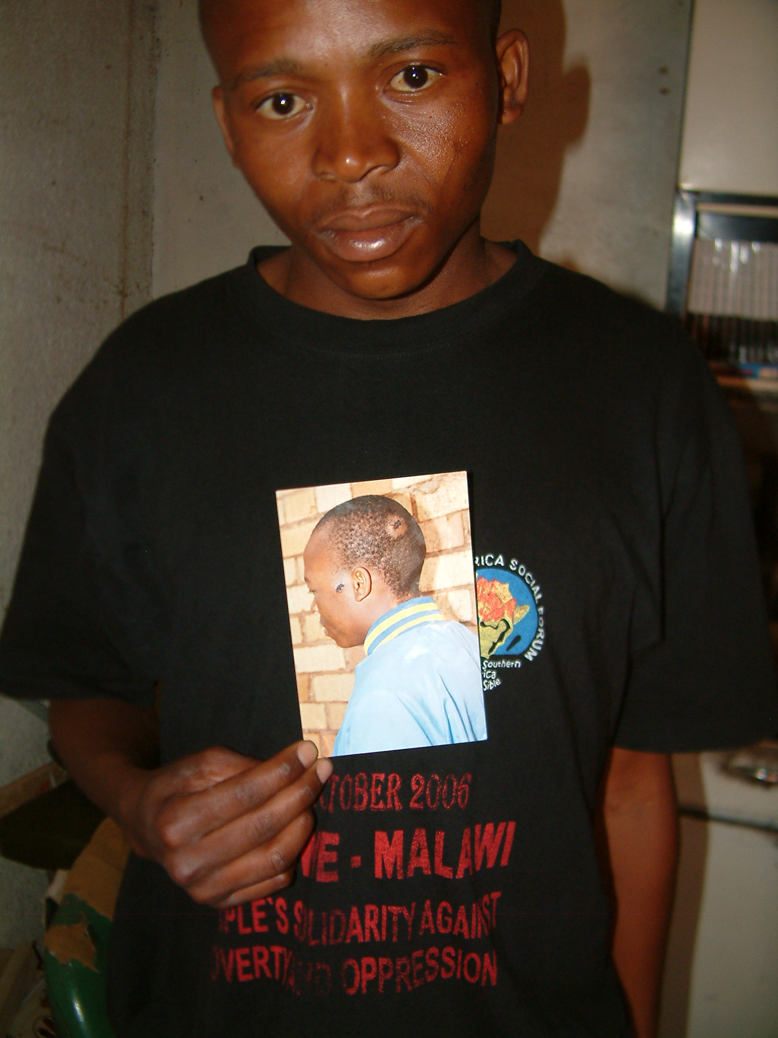 Siphwe Nkutha, of the Young Communist League's Khutsong branch, shows ...