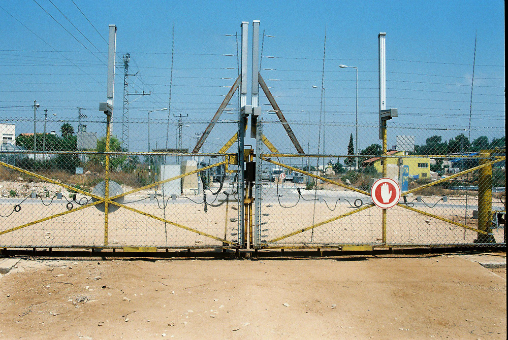A military gate in the fence at the edge of Mas`ha village. | Human ...
