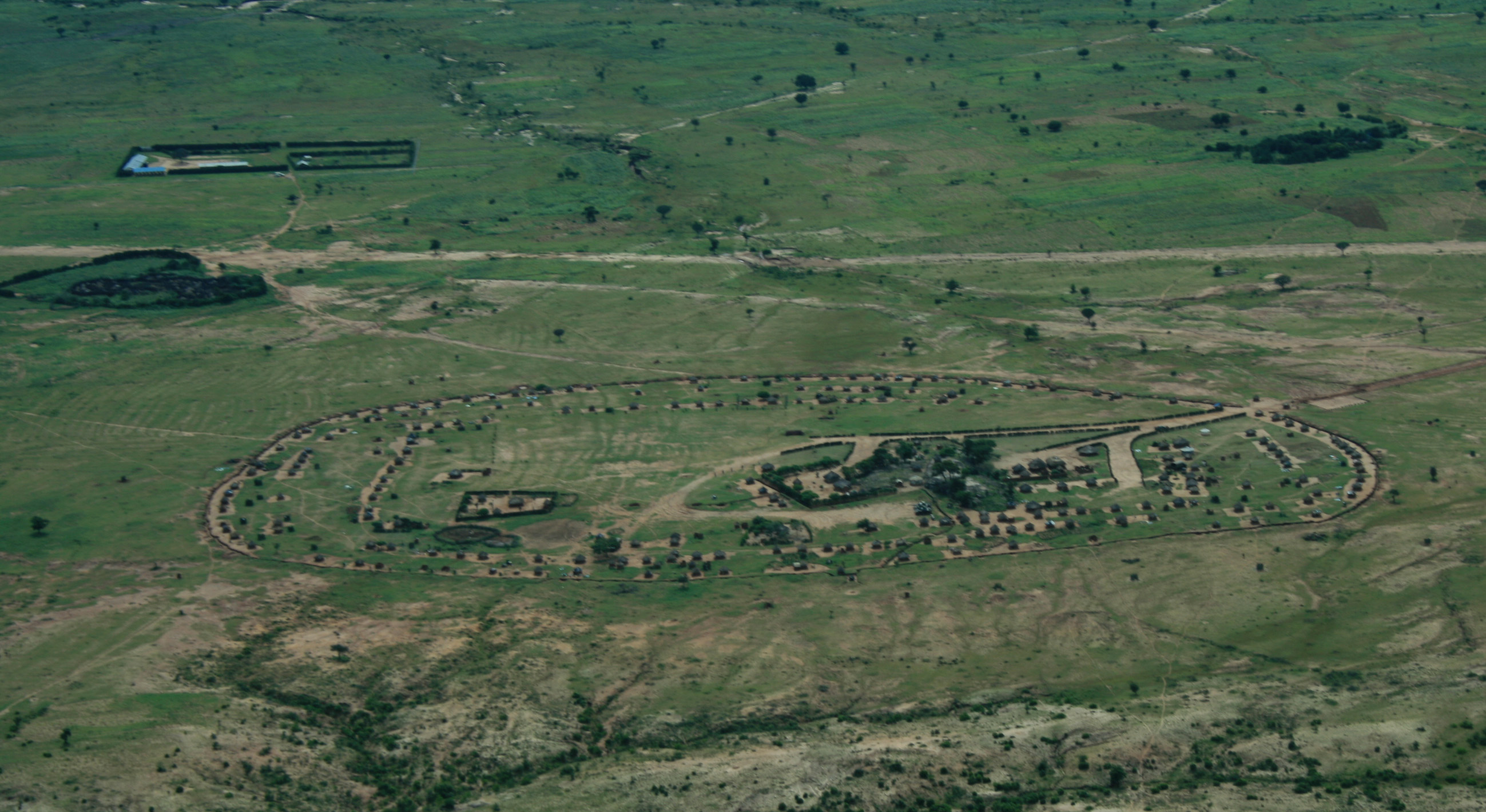 An aerial view of a manyatta in Kaabong District, Karamoja region ...
