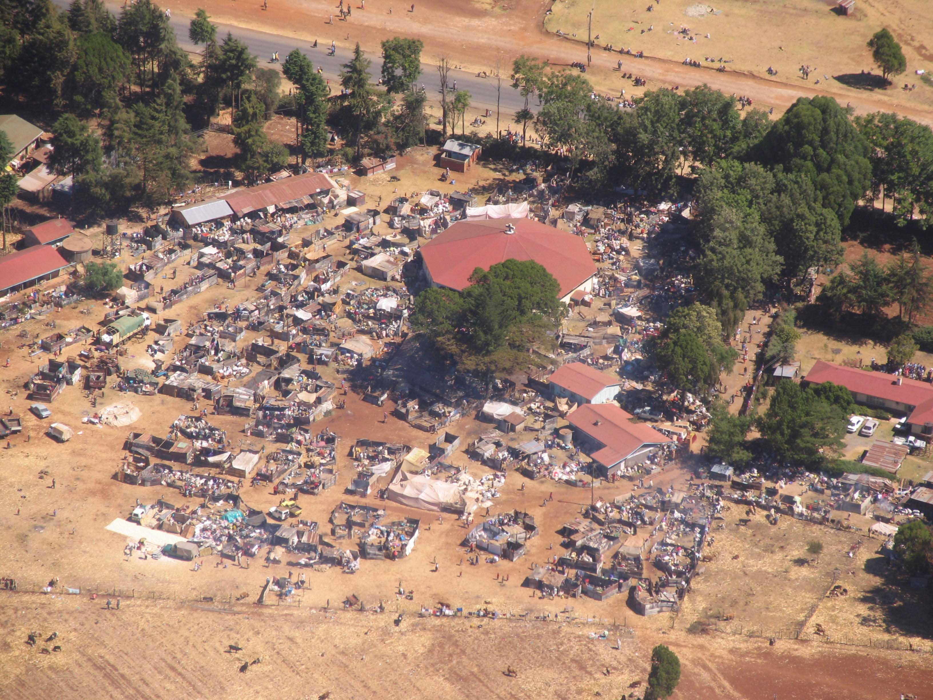 An aerial view of IDPs camping around a church in Burnt Forest, Kenya ...