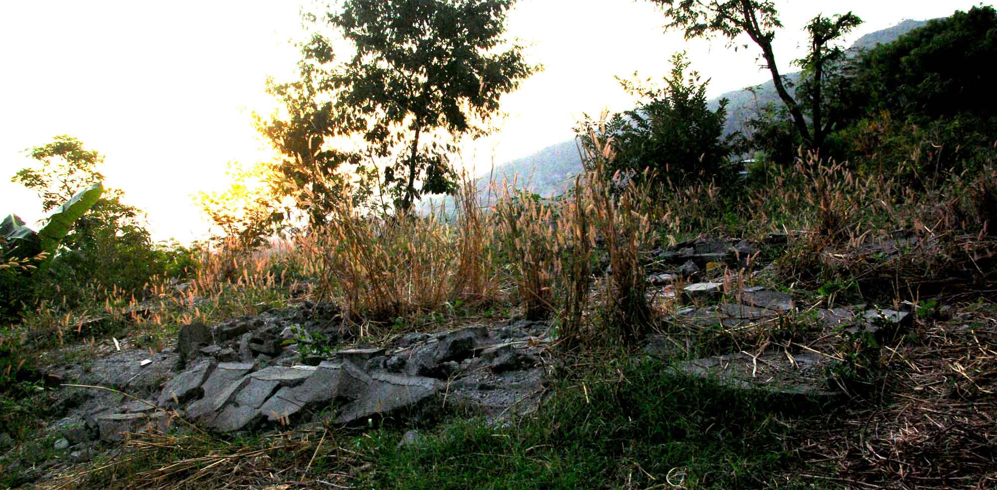 The remains of houses of eastern Timorese in Bacora, a suburb of Dili ...