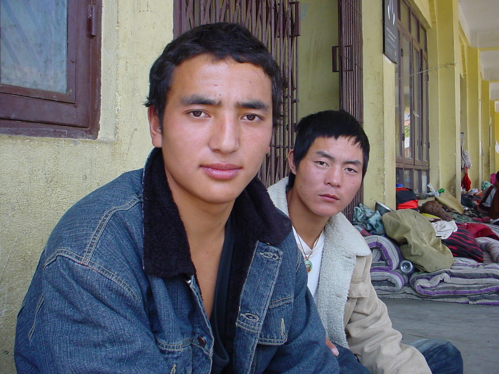 Two Tibetan refugees look to the camera in Kathmandu. Thousands of ...