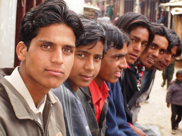 A group of young men look to the camera in Jumla District, one of Nepal ...