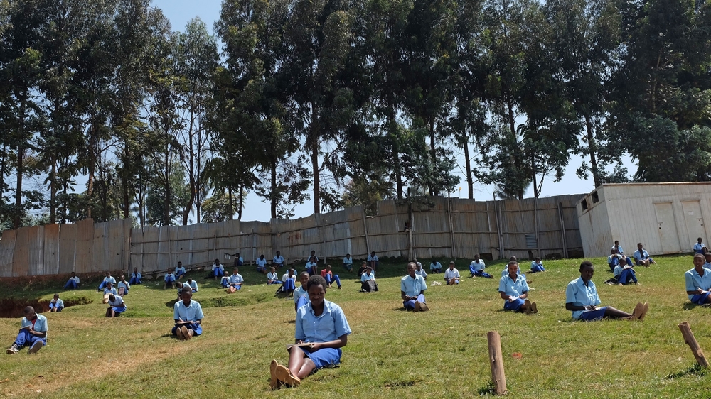 Schoolchildren take at test at Gihembe Refugee Camp in Rwanda | هجرة ...